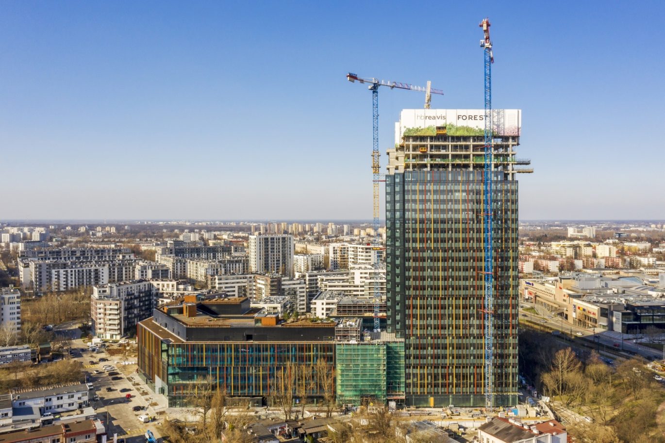 HB REAVIS COMPLETES CAMPUS-STYLE BUILDING AND TOPS OUT THE TOWER OF ...
